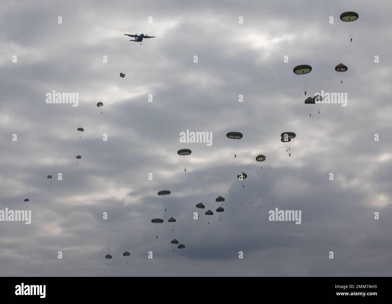 A group of U.S. Army and European Paratroopers conduct an Airborne jump ...