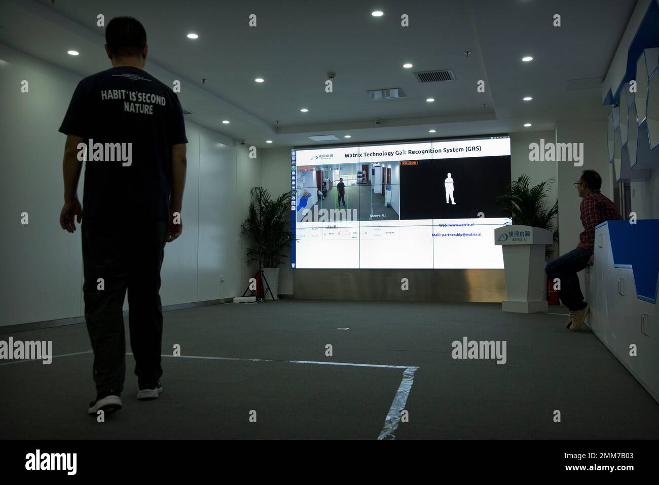 In this Oct. 31, 2018, photo, a Watrix employee walks around to enable ...