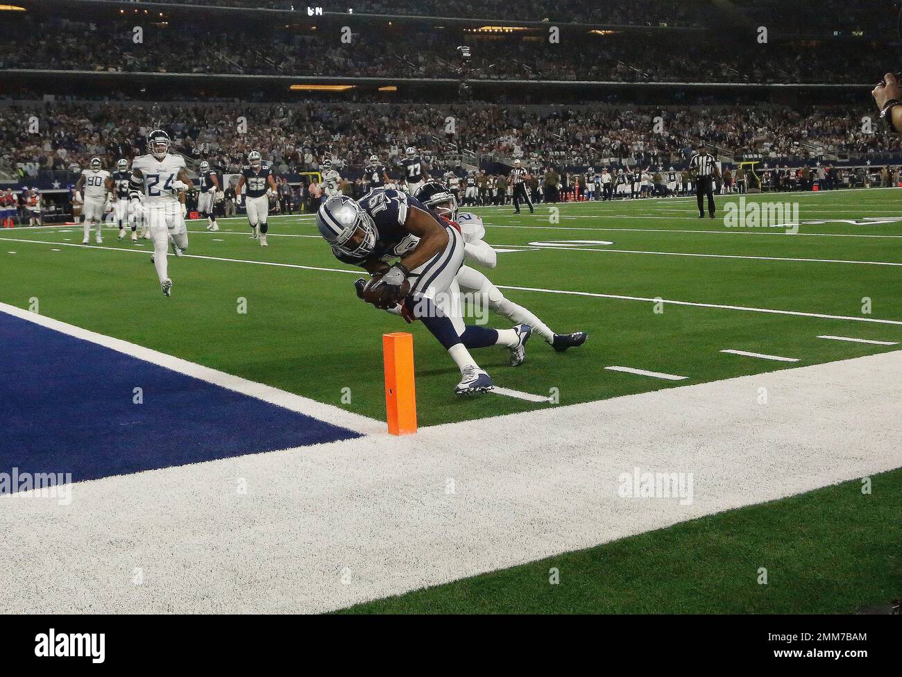 Dallas Cowboys wide receiver Amari Cooper (19) runs into the end zone ...