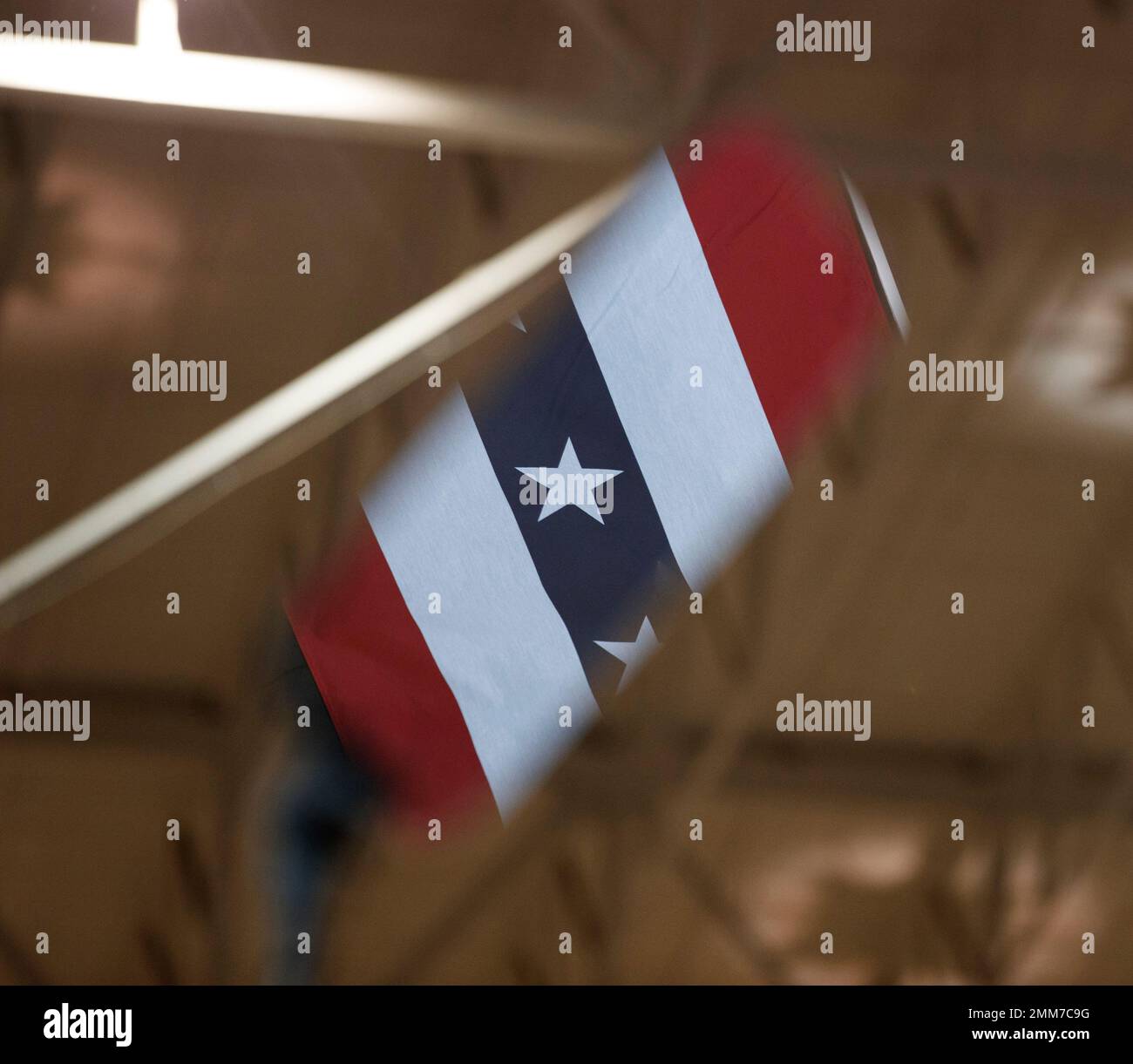 A tele-prompter reflects red white and blue as President Donald Trump ...