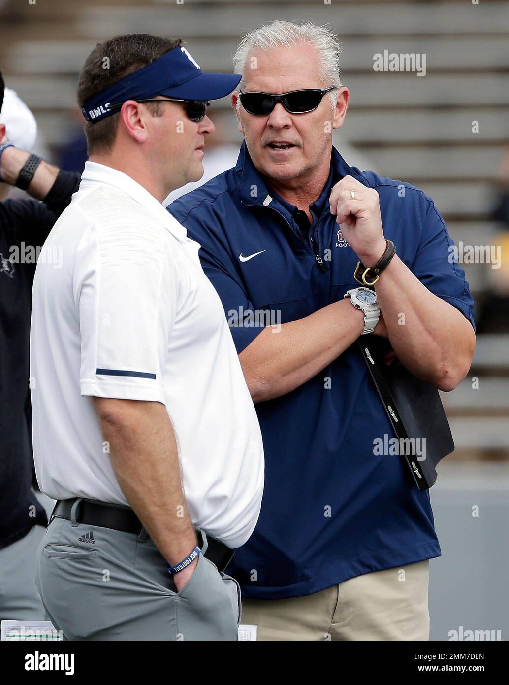 Rice head coach Mike Bloomgren, left, and UTEP head coach Dana Dimel ...