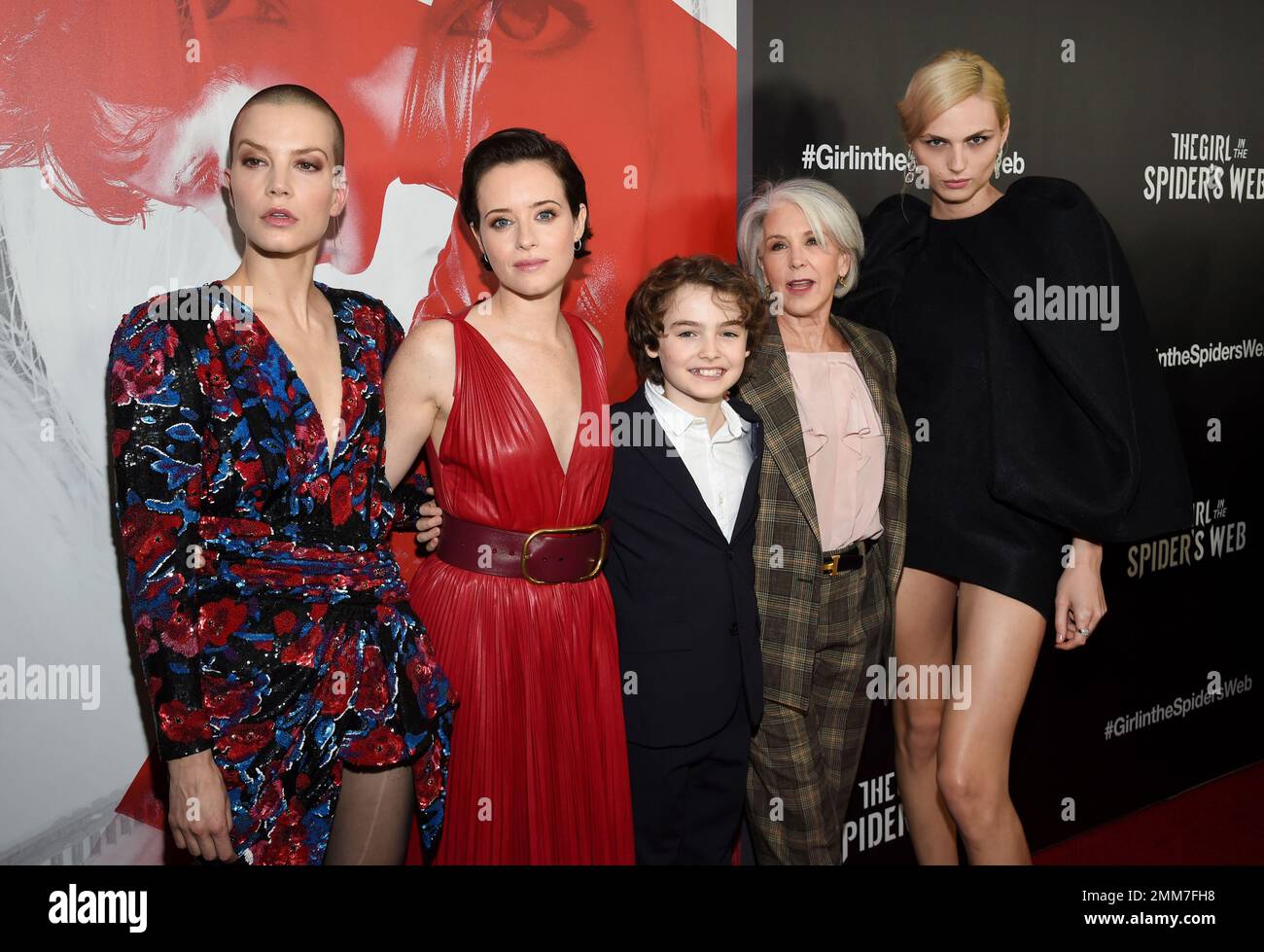 Actor Sylvia Hoeks, left, actor Claire Foy, actor Christopher Convery ...