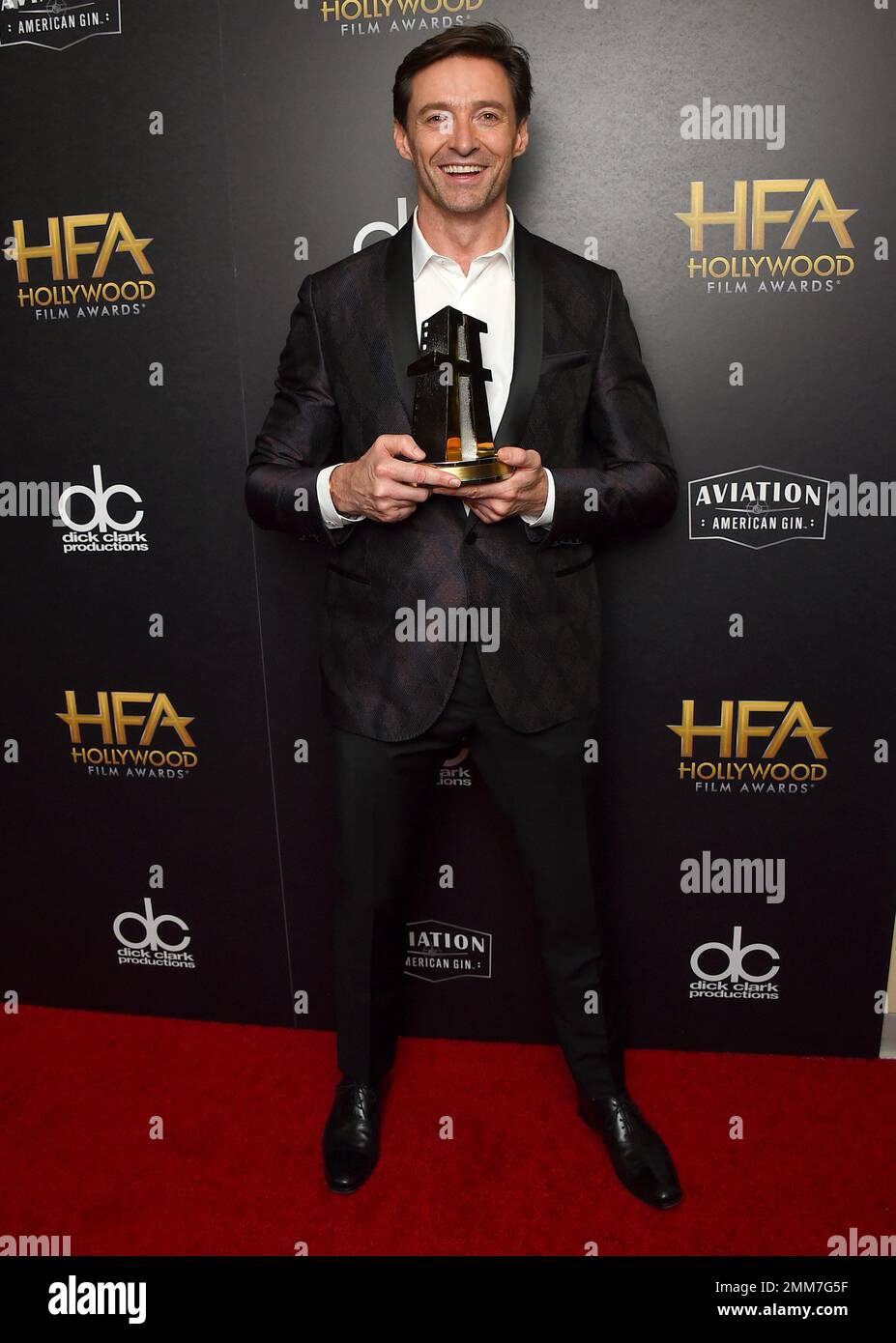 Hugh Jackman, winner of the Hollywood actor award for "The Front Runner ...