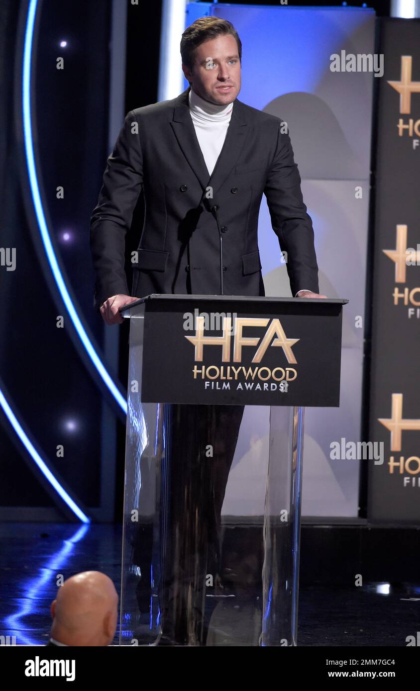 Armie Hammer presents the Hollywood supporting actor award at the Hollywood Film Awards on ...