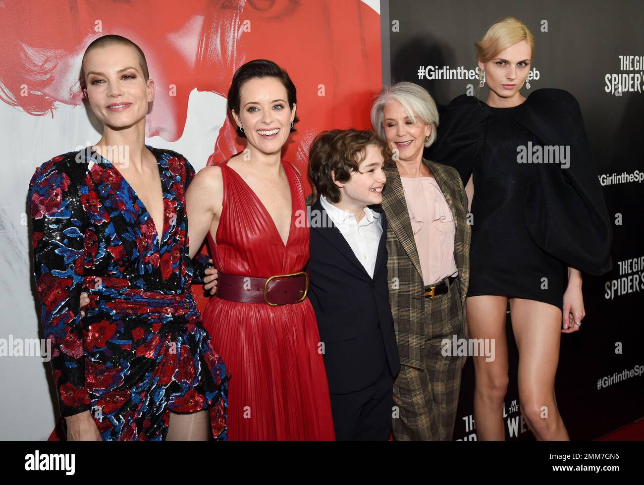Actor Sylvia Hoeks, left, actor Claire Foy, actor Christopher Convery ...