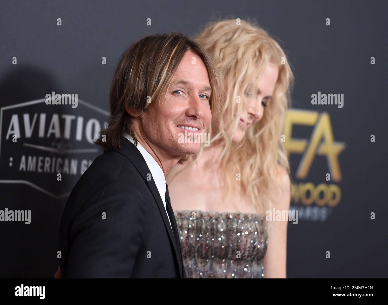 Keith Urban, left, and Nicole Kidman arrive at the Hollywood Film ...