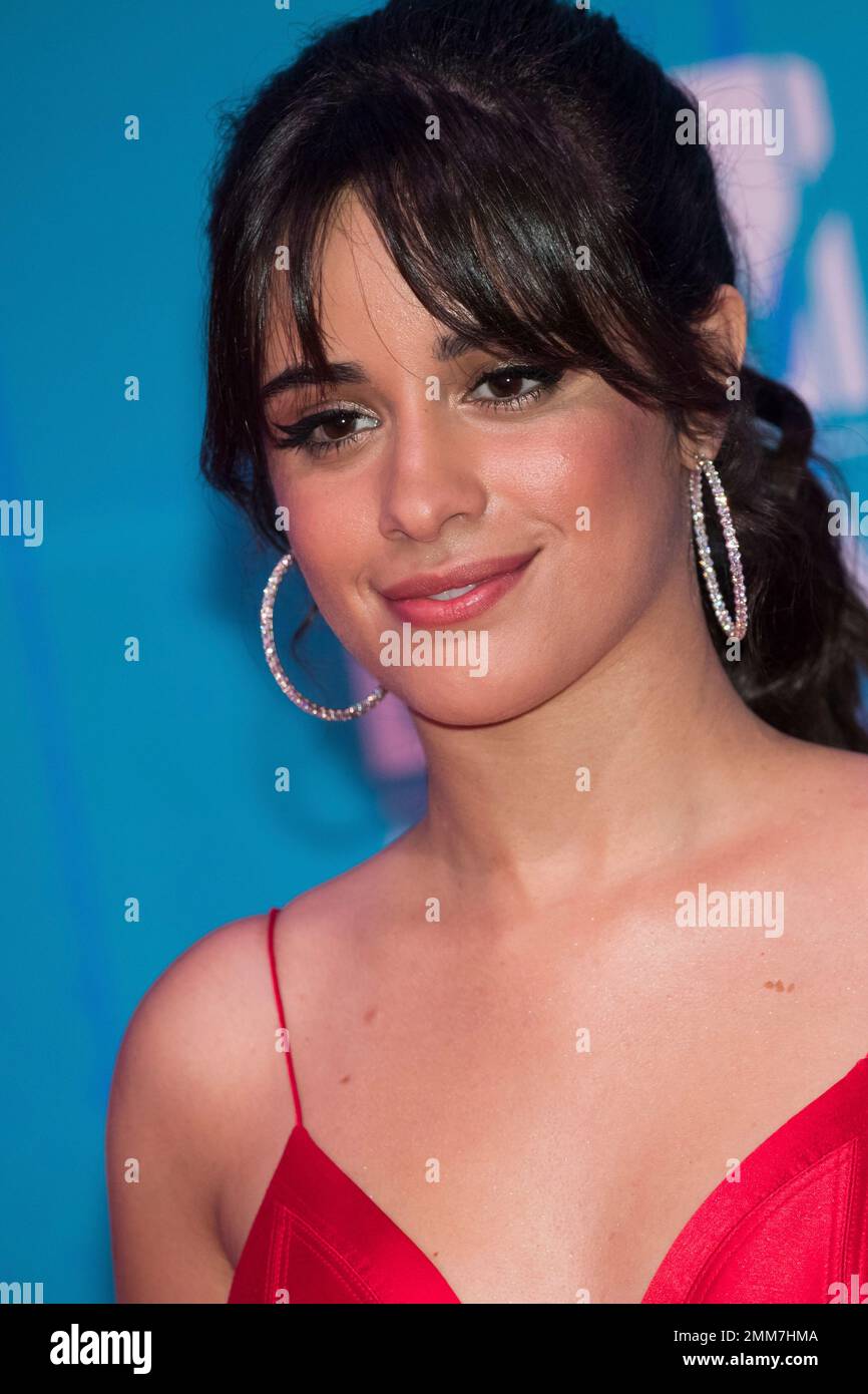 Singer Camila Cabello poses for photographers upon arrival at the ...