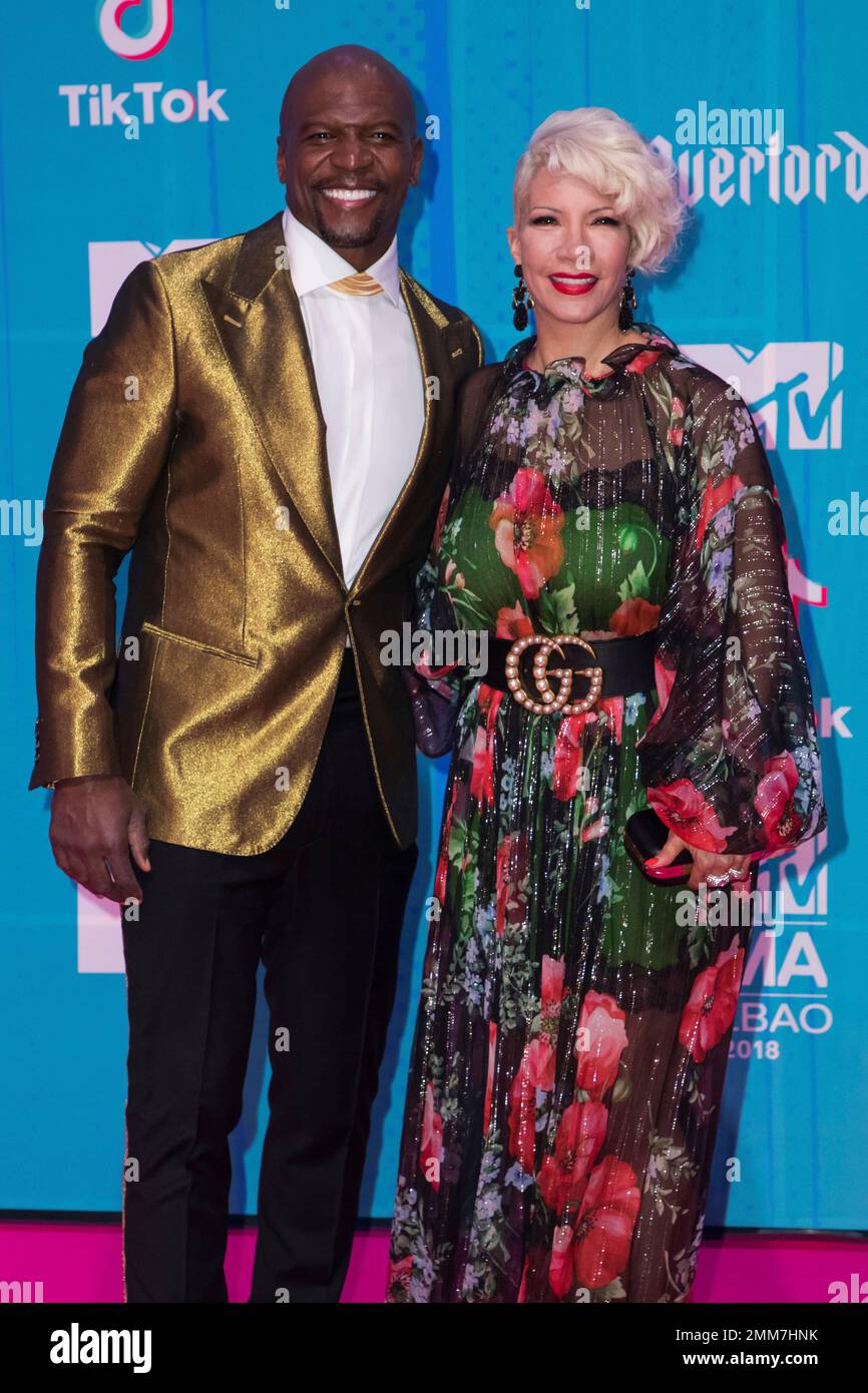 Actor Terry Crews, left, and Rebecca King Crews pose for photographers ...