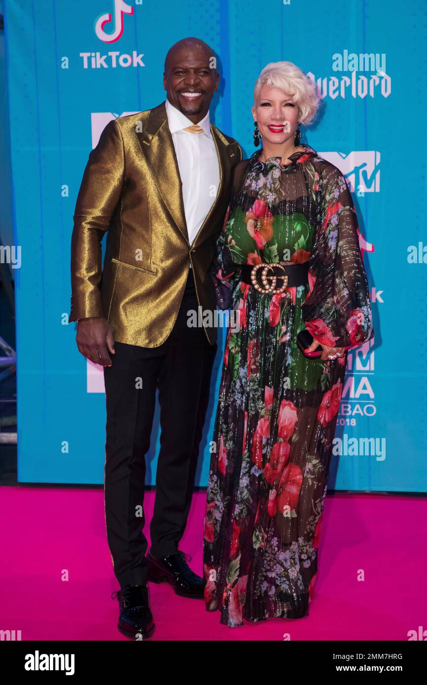 Actor Terry Crews, left, and Rebecca King Crews pose for photographers ...