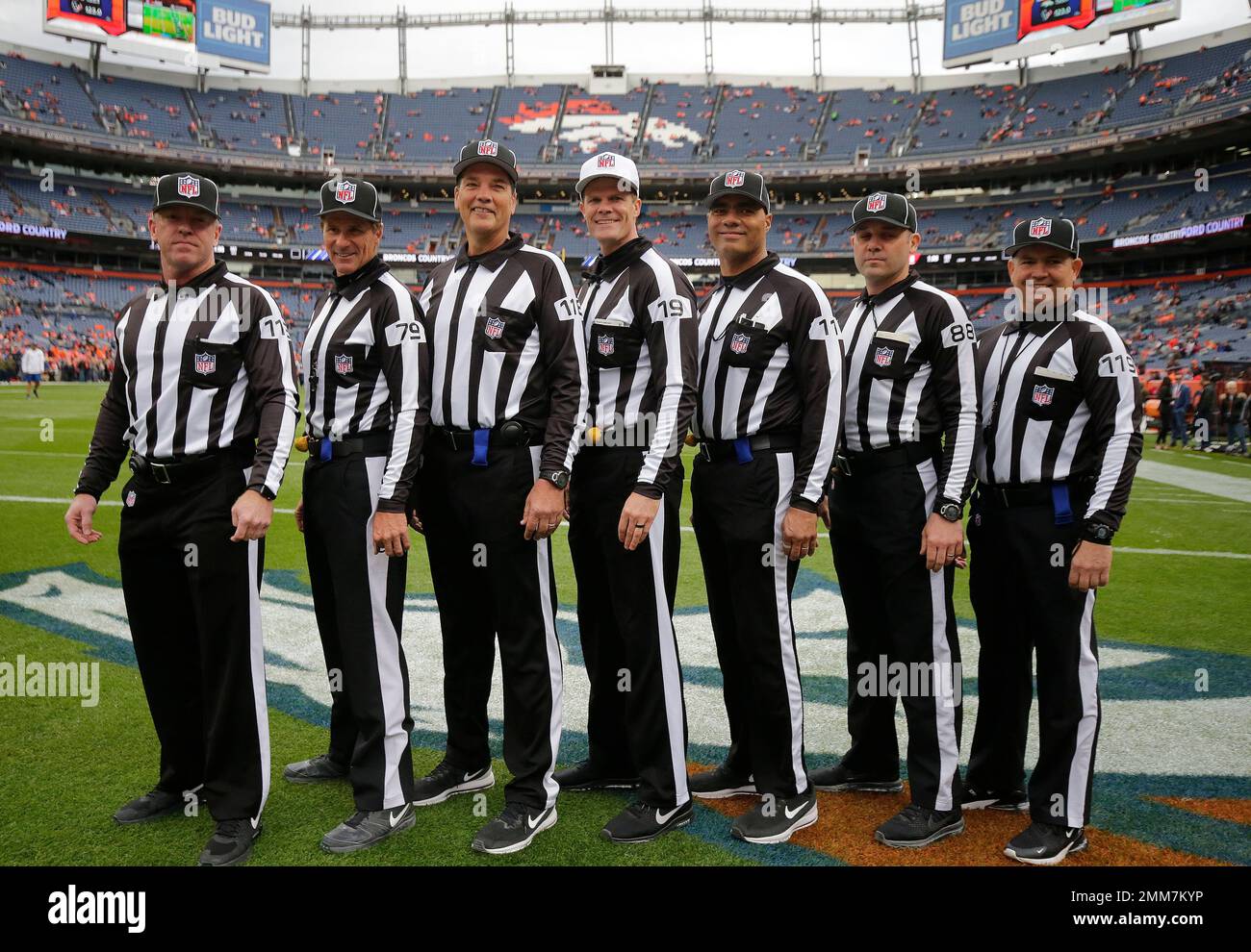 Down judge Danny Short, head linesman Kent Payne (79), side judge Dave ...
