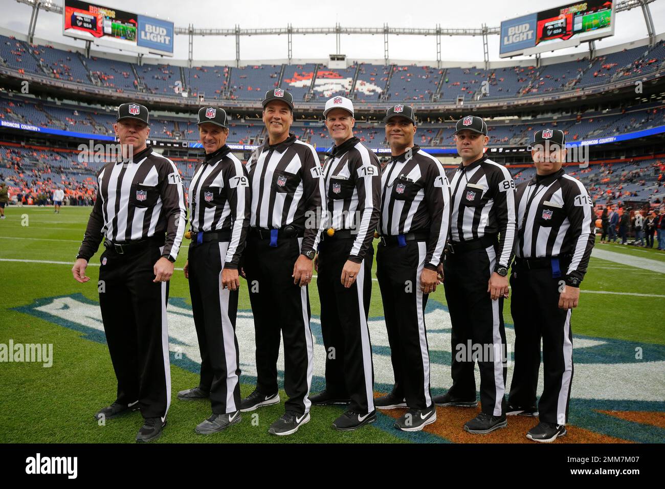 Down judge Danny Short, head linesman Kent Payne (79), side judge Dave ...
