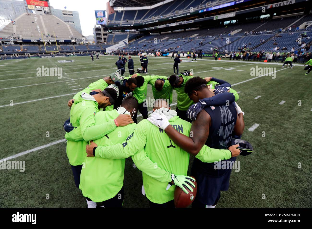 Seattle Seahawks players, including quarterback Russell Wilson, front ...