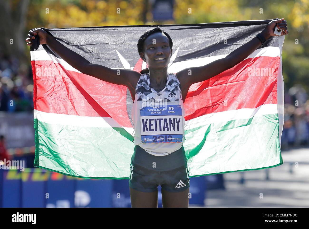 First place finisher Mary Keitany of Kenya poses for a picture at the ...