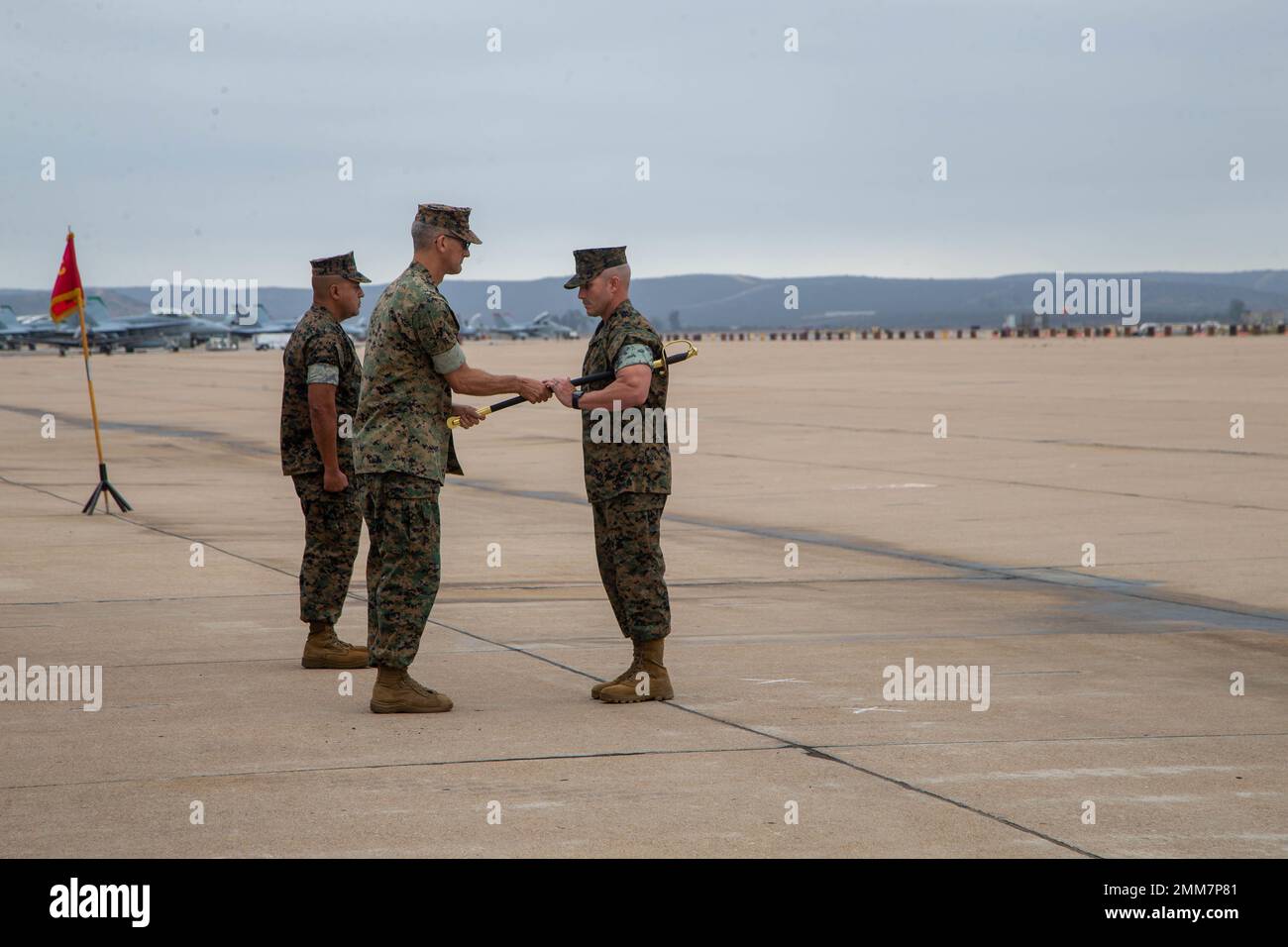 U.S. Marine Corps Col. Sean P. Hoewing, middle, commanding officer of ...