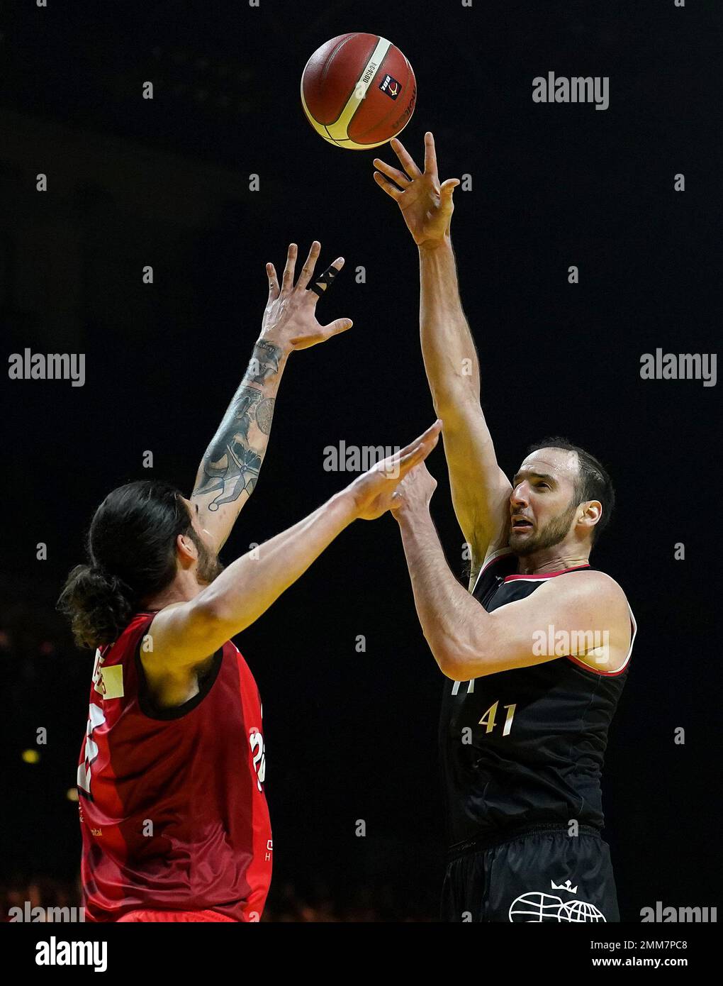 London Lions' Kosta Koufos shoots over Leicester Riders' Aaron Menzies ...