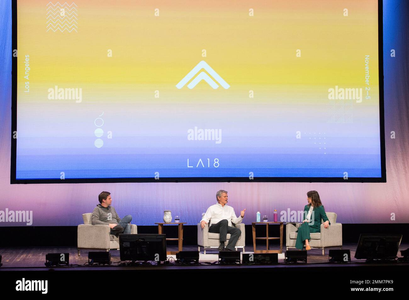 J. D. Vance, left, and Steve Case, center, seen on day two of Summit ...