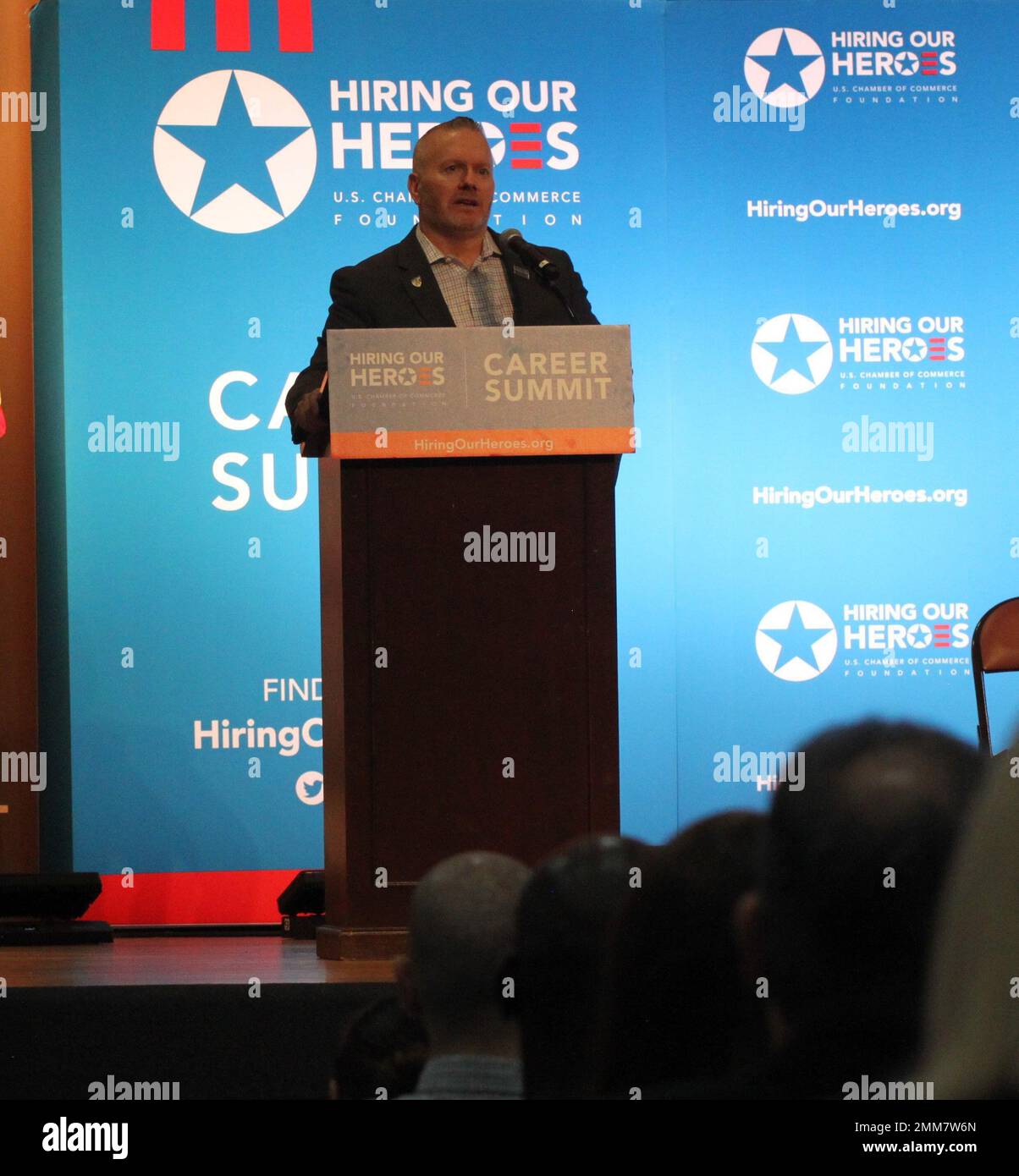 Retired Command Sgt. Maj. John Wayne Troxell speaks to service members ...