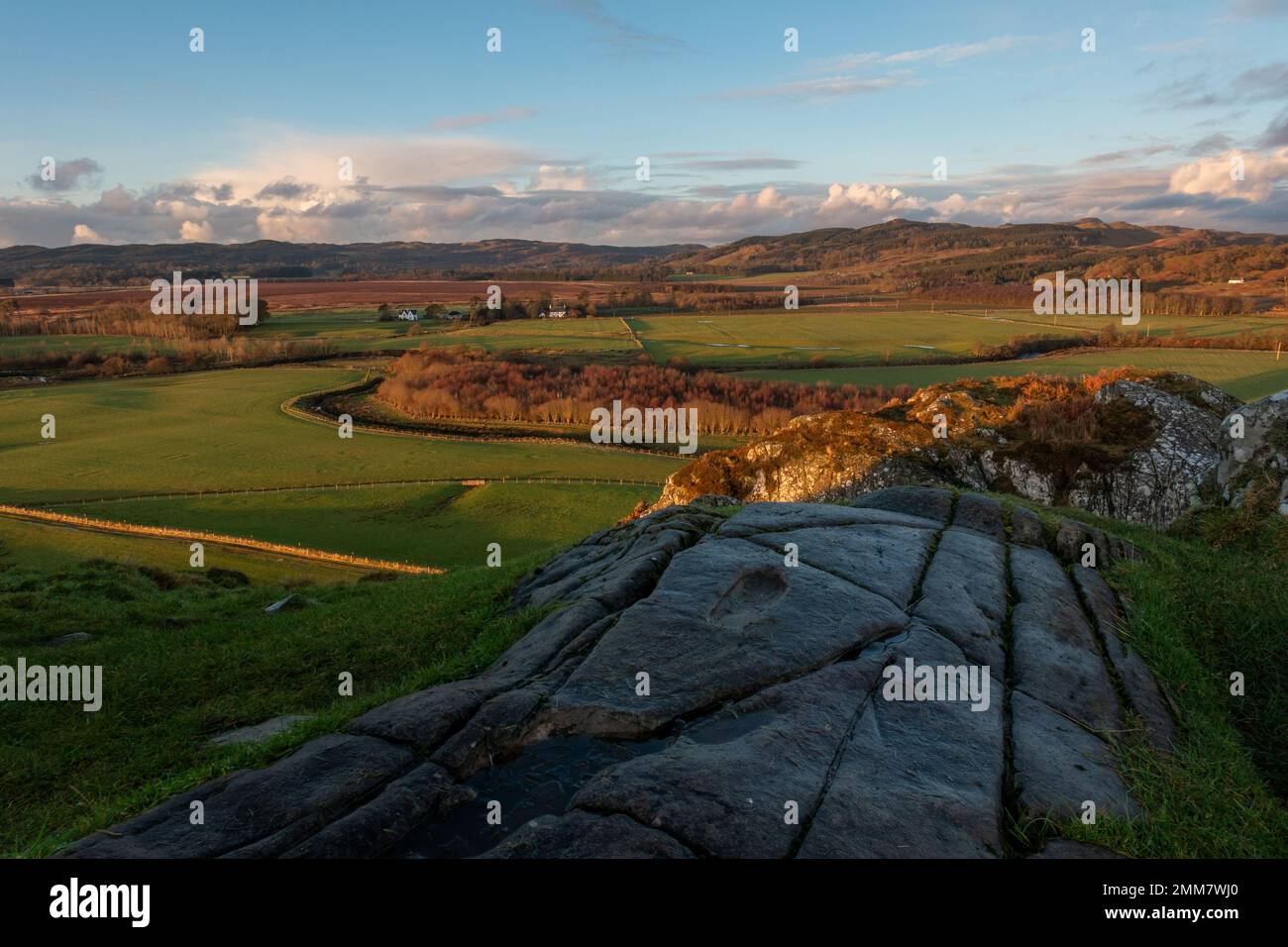 Dunadd hill fort looking over Moine Mhor with an ancient stone carving ...