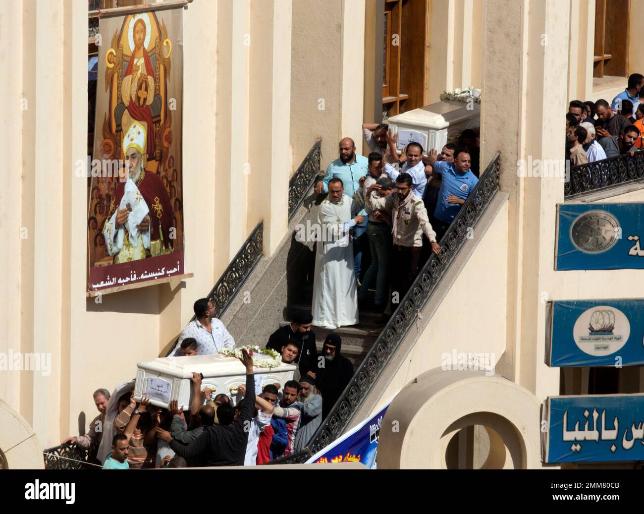 Relatives and friends carry the coffins of the brothers Nadi Yousef ...