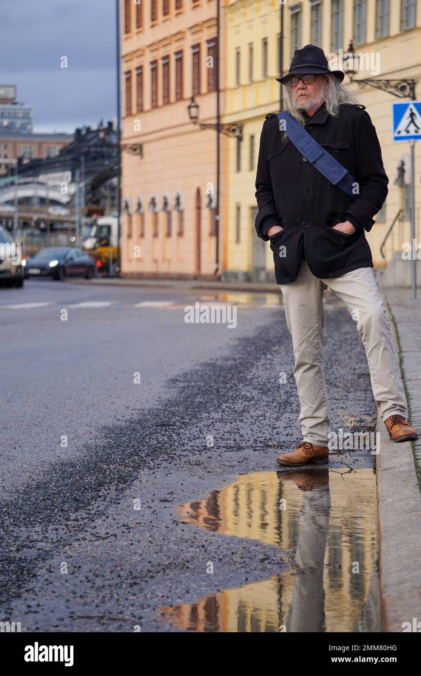Man standing on road hi-res stock photography and images - Alamy