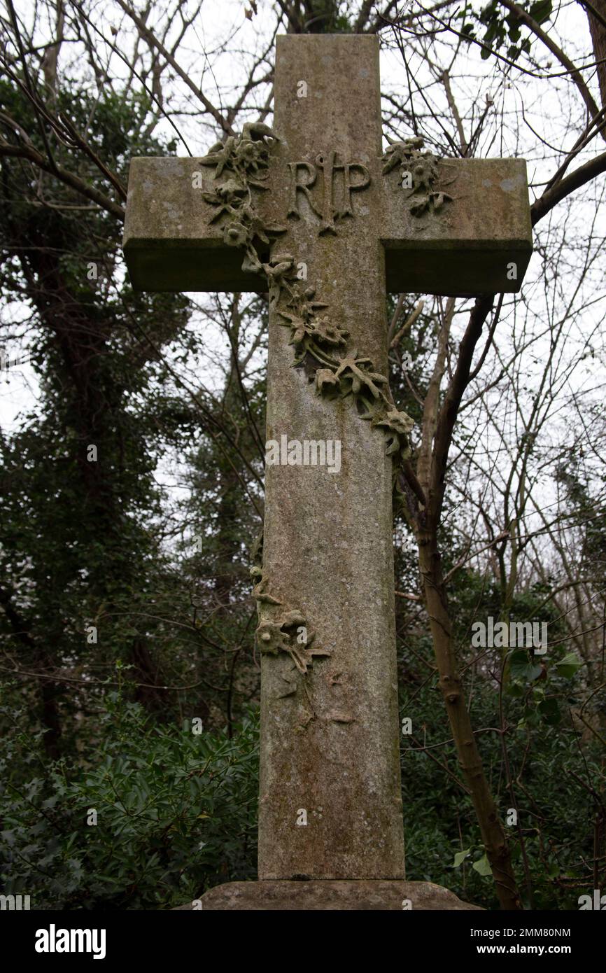 RIP on a carved ivy-covered cross headstone in Nunhead Cemetery, one of ...
