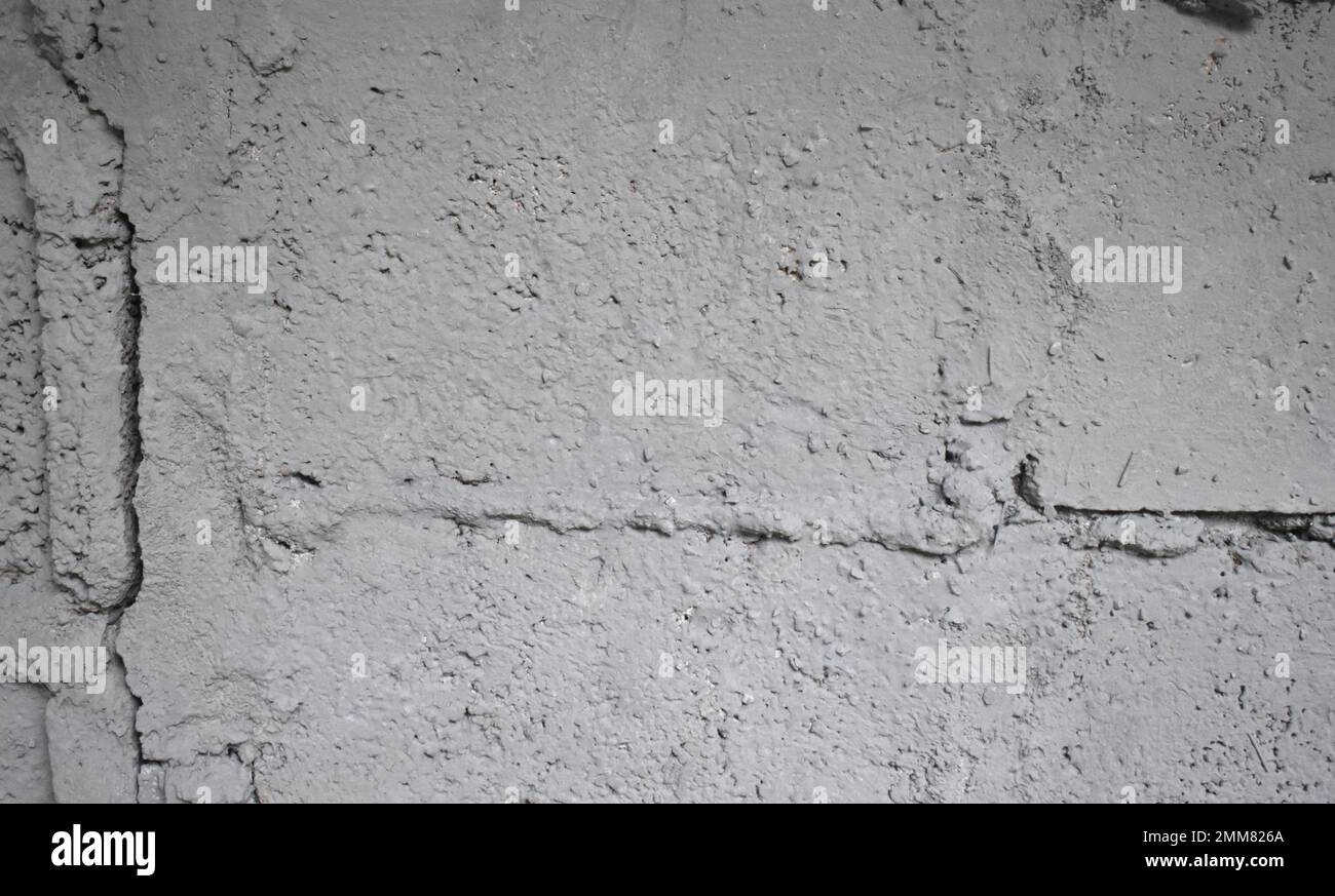 Part of uneven surface of plastered house Stock Photo - Alamy