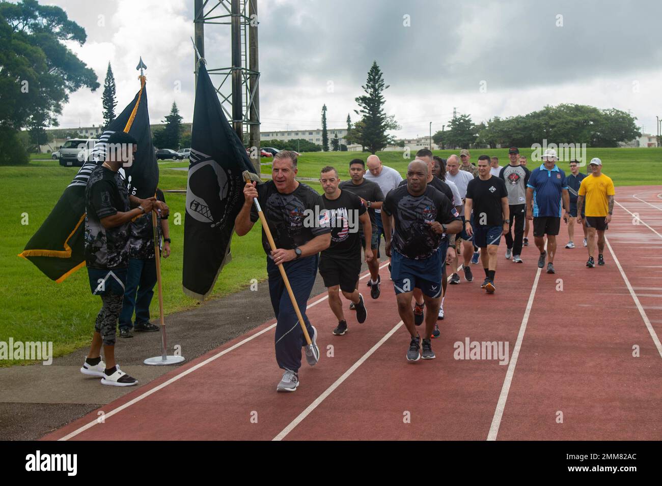 Brig. Gen. David Eaglin, 18th Wing commander, carries the guidon to ...