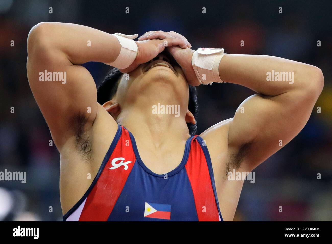 Bronze medallist Carlos Edriel Yulo of the Philippines celebrates after ...