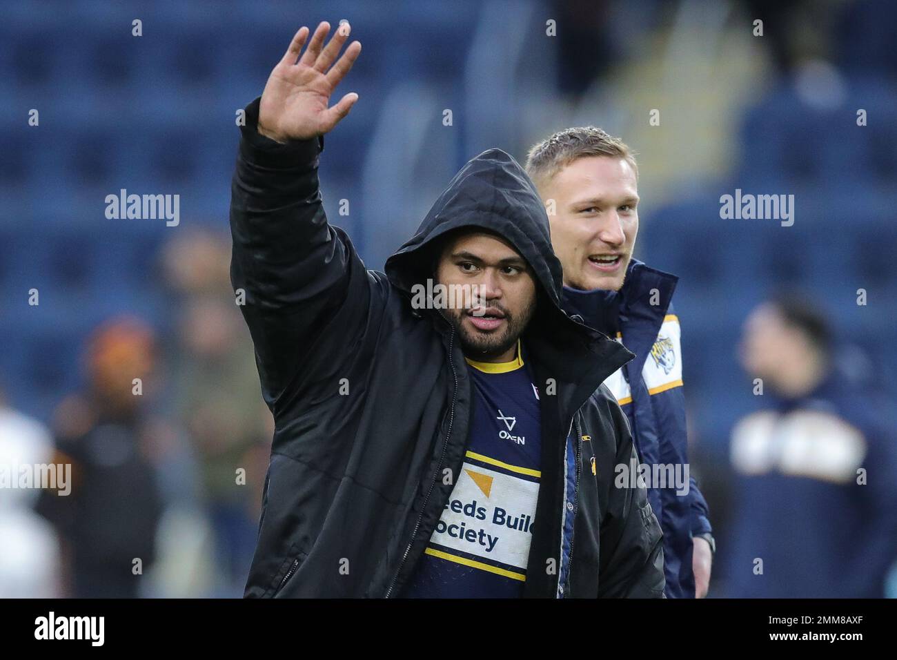 Sam Lisone #15 of Leeds Rhinos gestures to the crowd after the Rugby ...