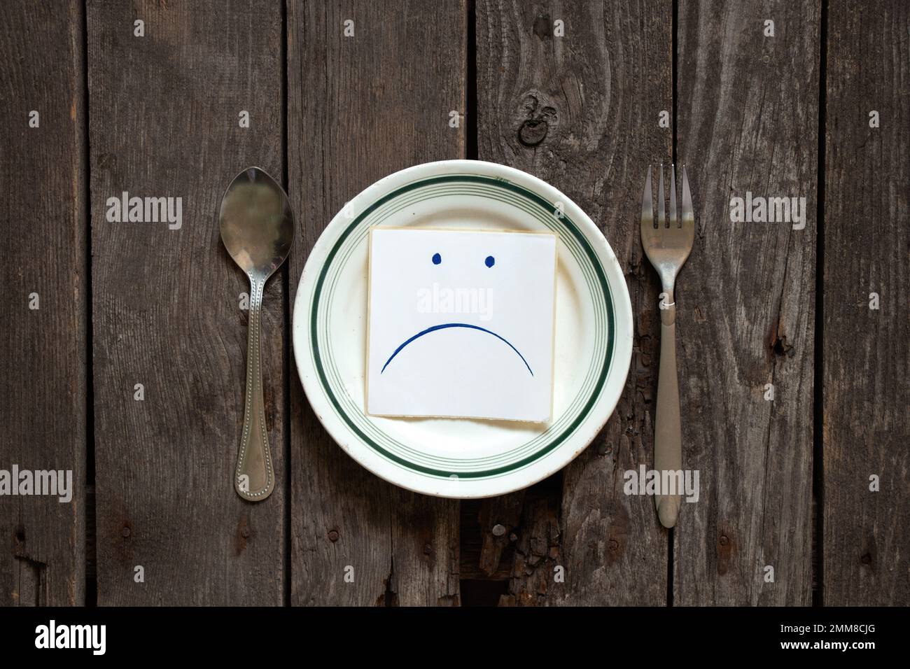 Empty plate hunger hi-res stock photography and images - Alamy