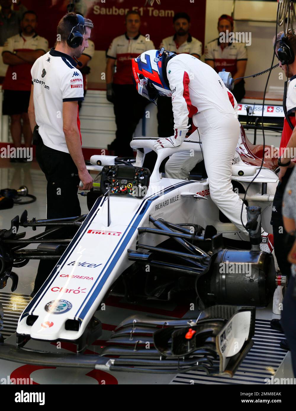 Colombian Formula One driver Tatiana Calderon boards her car as she ...