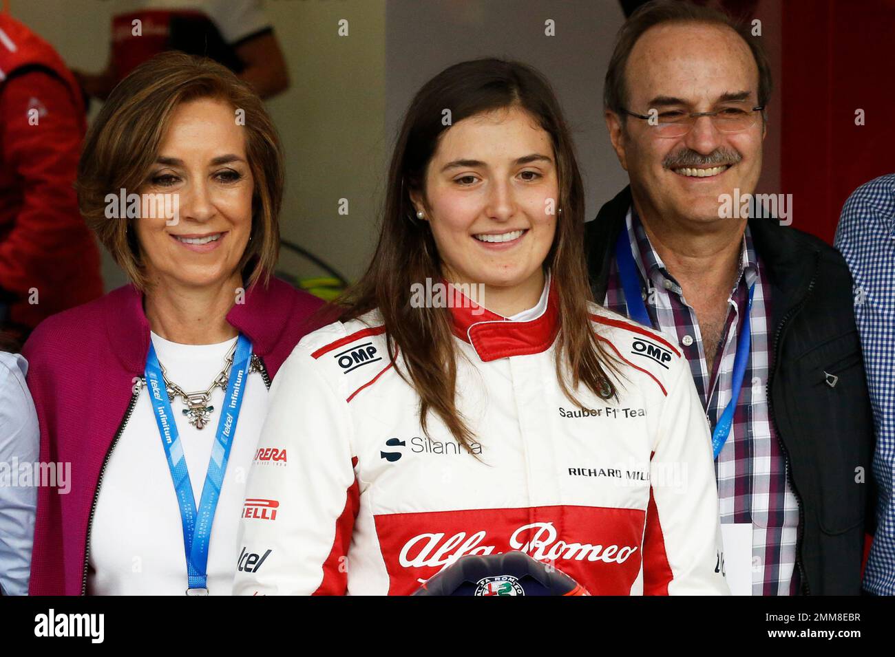 Colombian Formula One driver Tatiana Calderon, center, poses with her ...