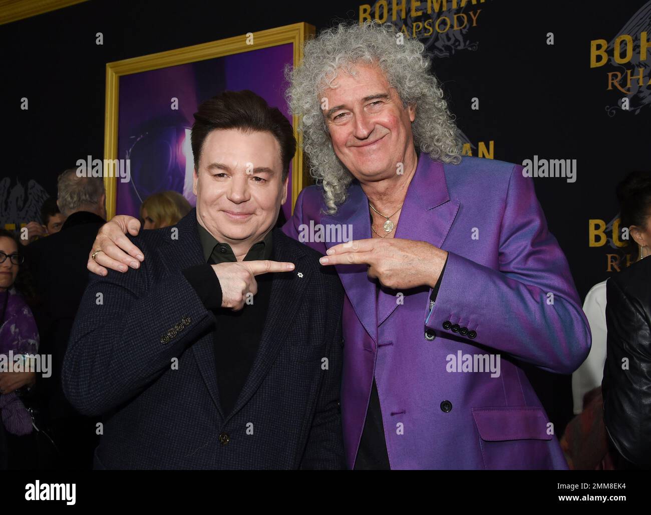 Actor Mike Myers, left, and musician Brian May attend the premiere of ...