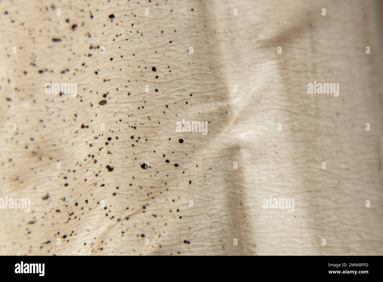 brown paper with spots of paint for the background, splashes of paint ...