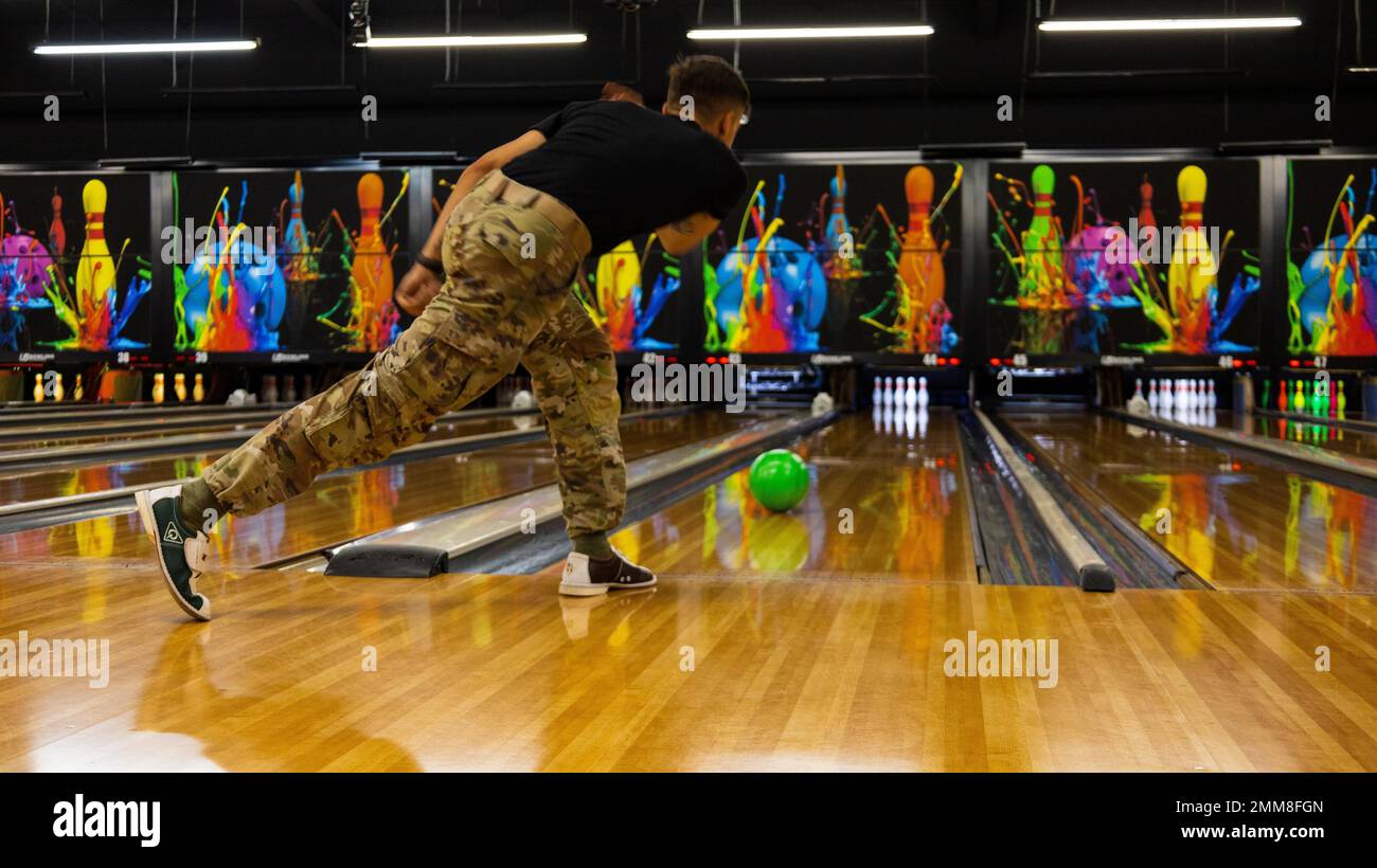 Soldiers compete in a bowling tournament during 1st Cavalry Division's ...