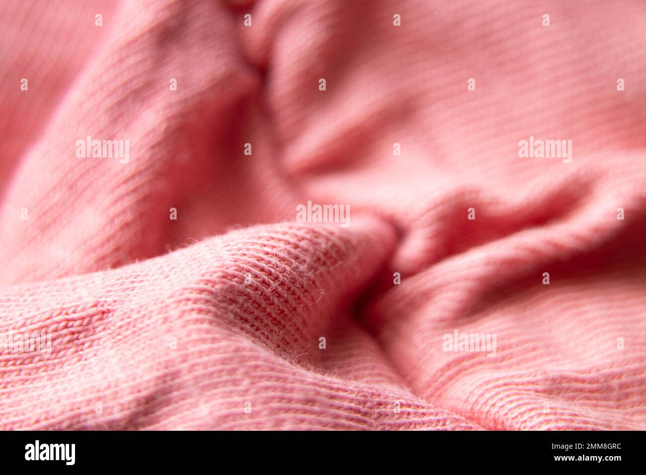 pink crumpled fabric as a background macro photo, pink background Stock ...