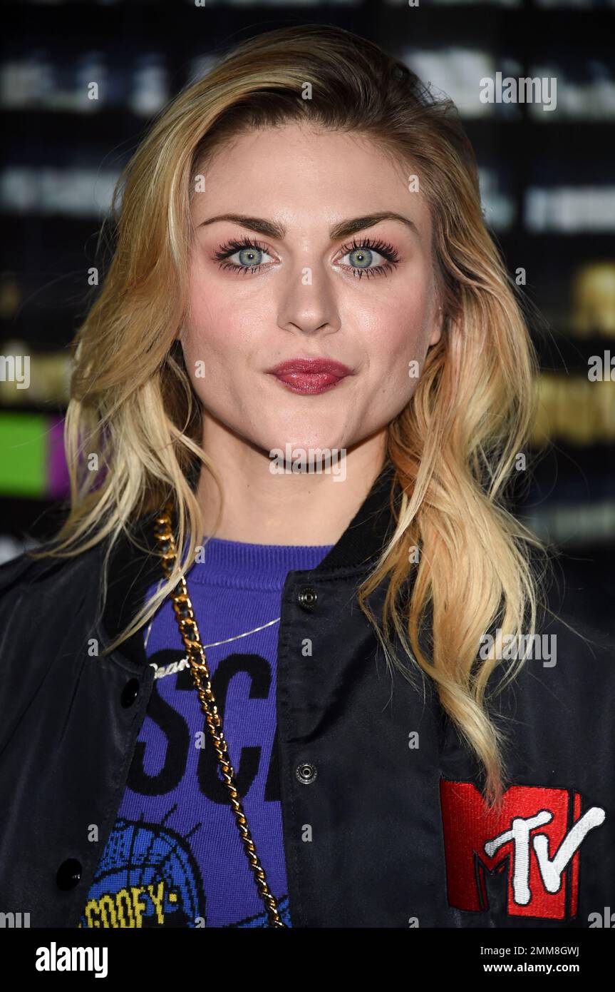 Frances Bean Cobain attends the Moschino x H&M fashion show at Pier 36 ...