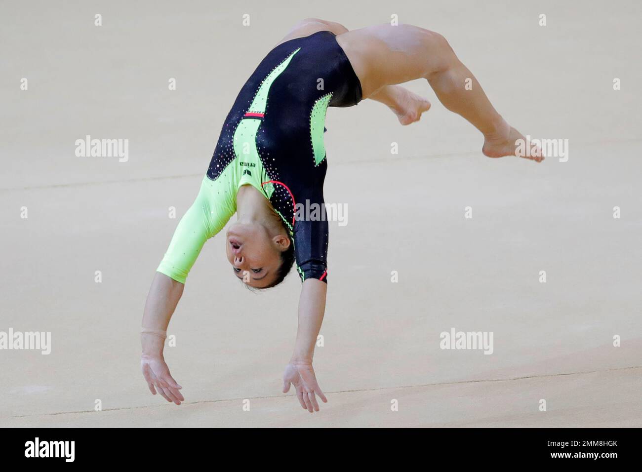 Germany's Kim Bui performs on the floor during the women's team final ...