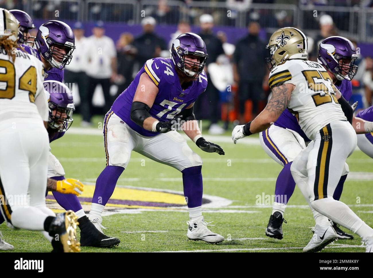 Minnesota Vikings offensive guard Mike Remmers (74) looks to make a ...