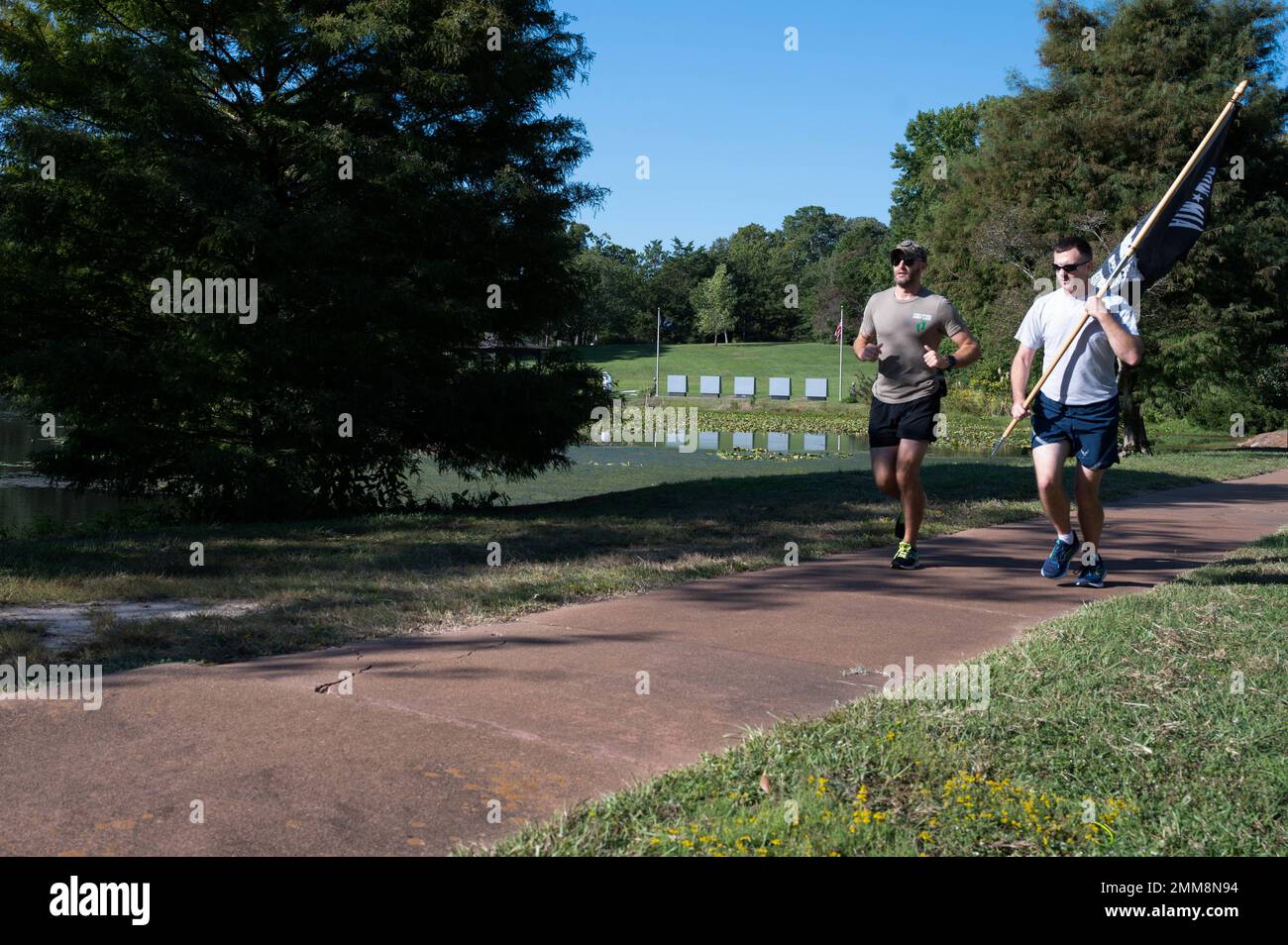 U.S. Air Force Master Sgt. Scott Foster (left) and U.S. Air Force Staff ...