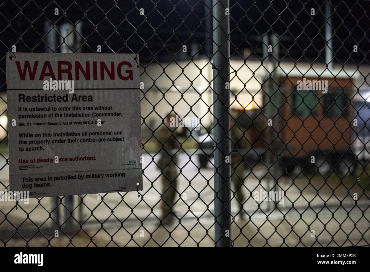 Airmen from the 5th Security Forces Squadron guard the Weapon Storage ...