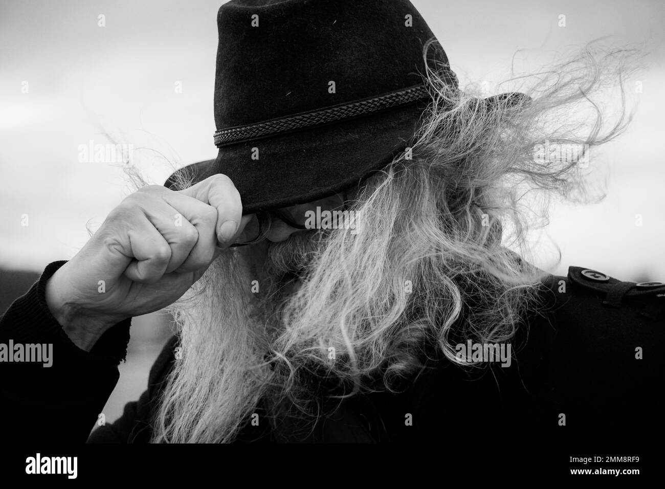 Wearing hat fedora Black and White Stock Photos & Images - Alamy