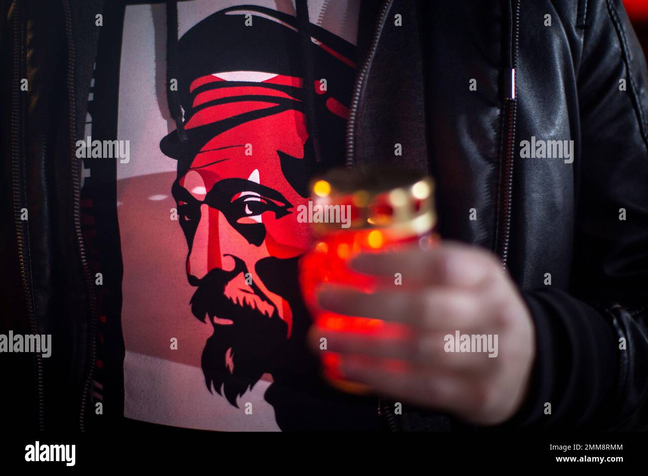 A man dressed in a T-shirt with a portrait of Felix Dzerzhinsky, the ...