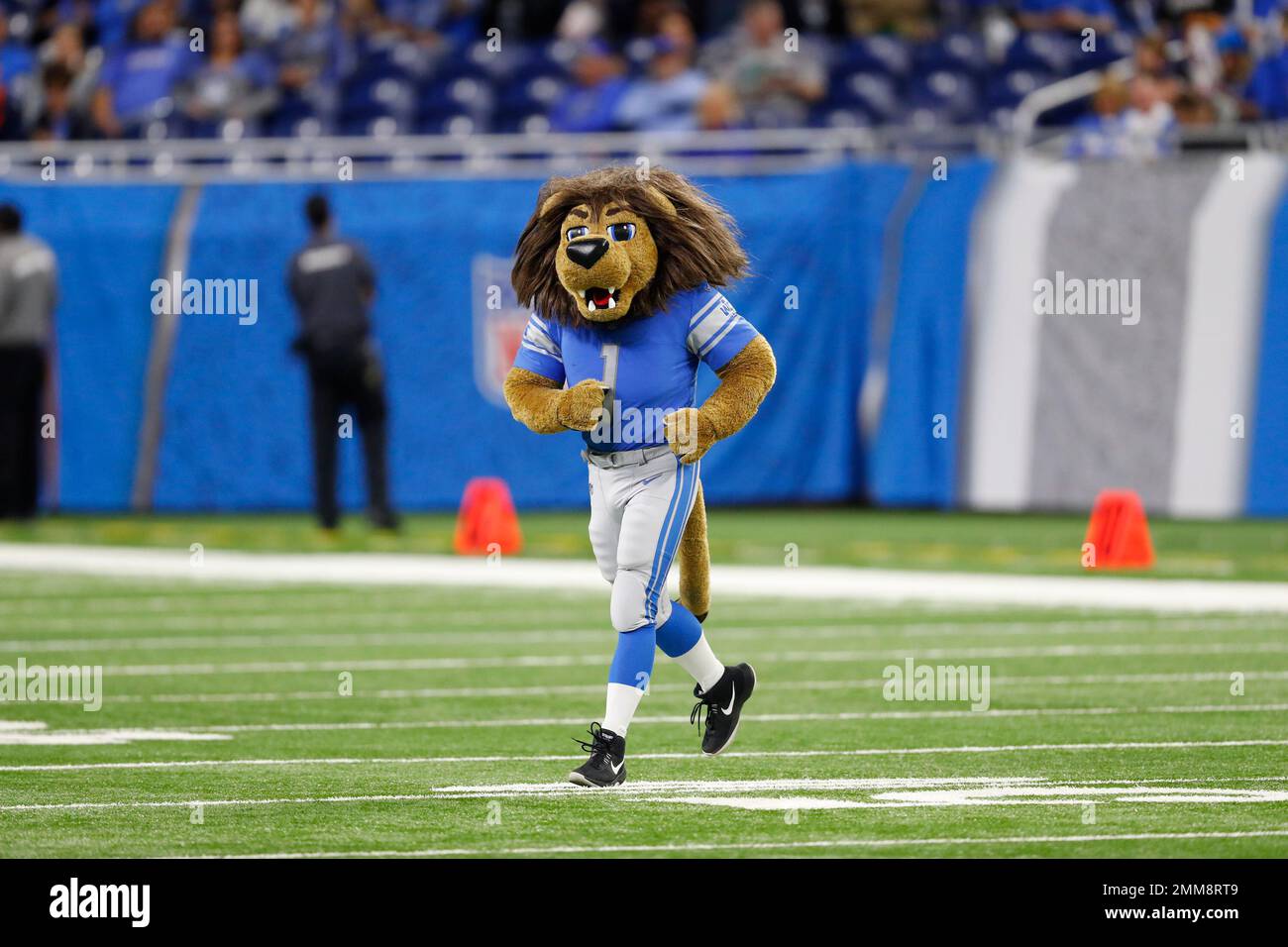 Detroit Lions mascot Roary runs on the field before an NFL football ...
