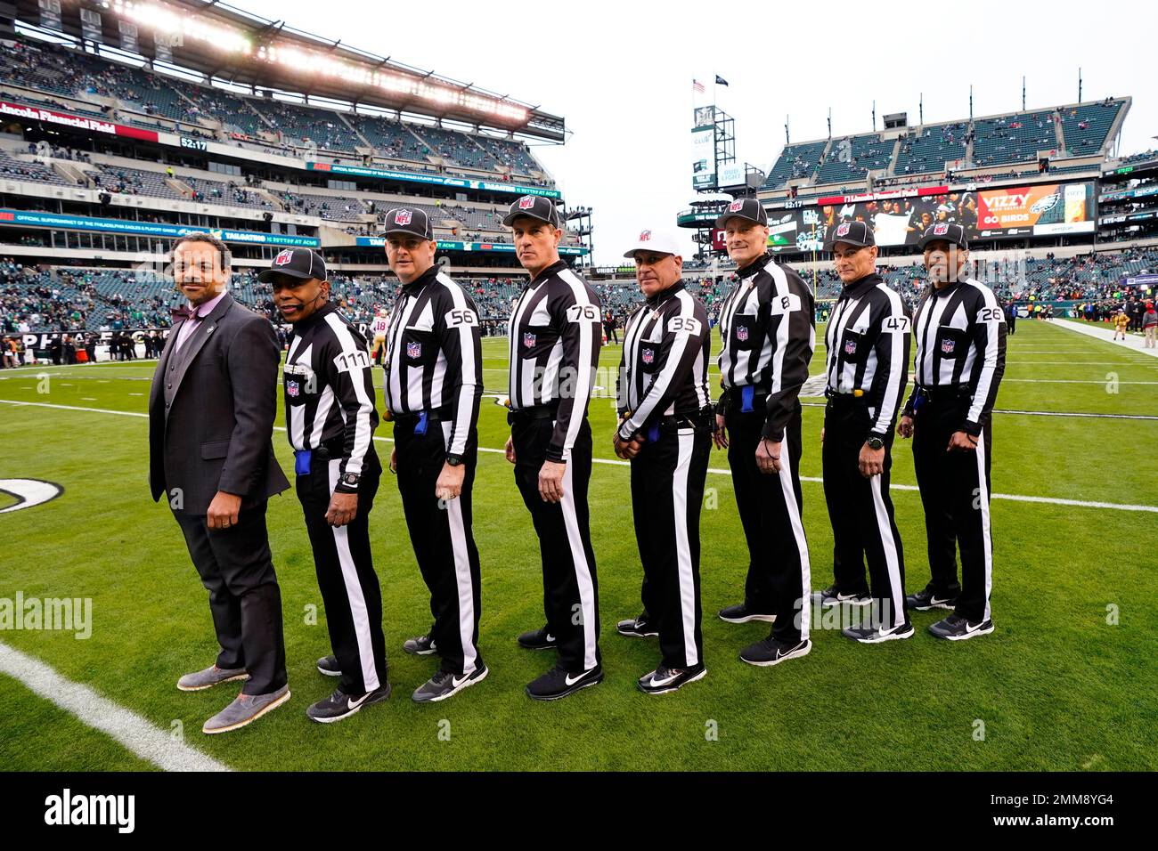 From left, back judge Terrence Miles (111), side judge Allen Baynes (56 ...