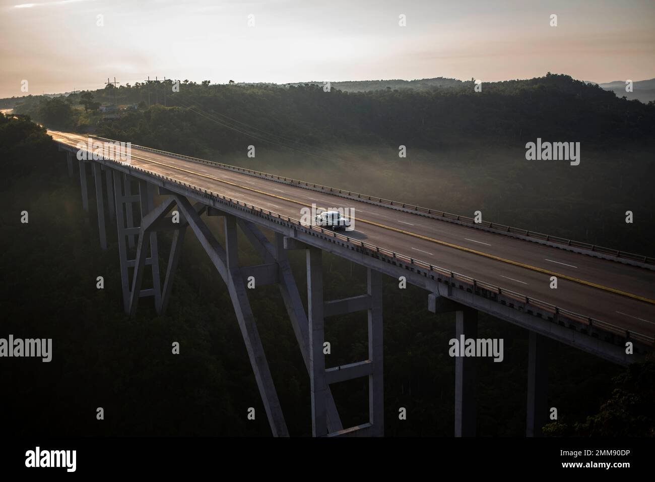 A car crosses the Bacunayagua bridge marking the border between the ...