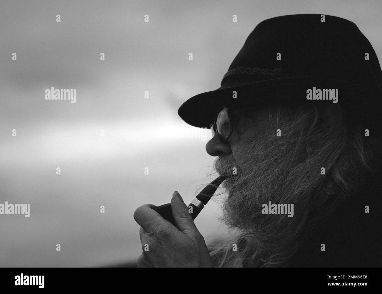 Close up side view man smoking Black and White Stock Photos & Images ...