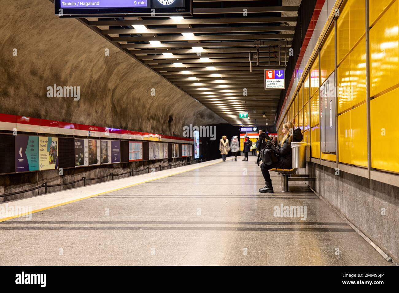 People waiting for train at Sörnäinen metro station in Helsinki ...