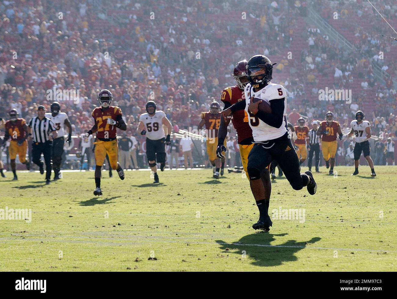 Arizona State quarterback Manny Wilkins (5) runs for a touchdown ...