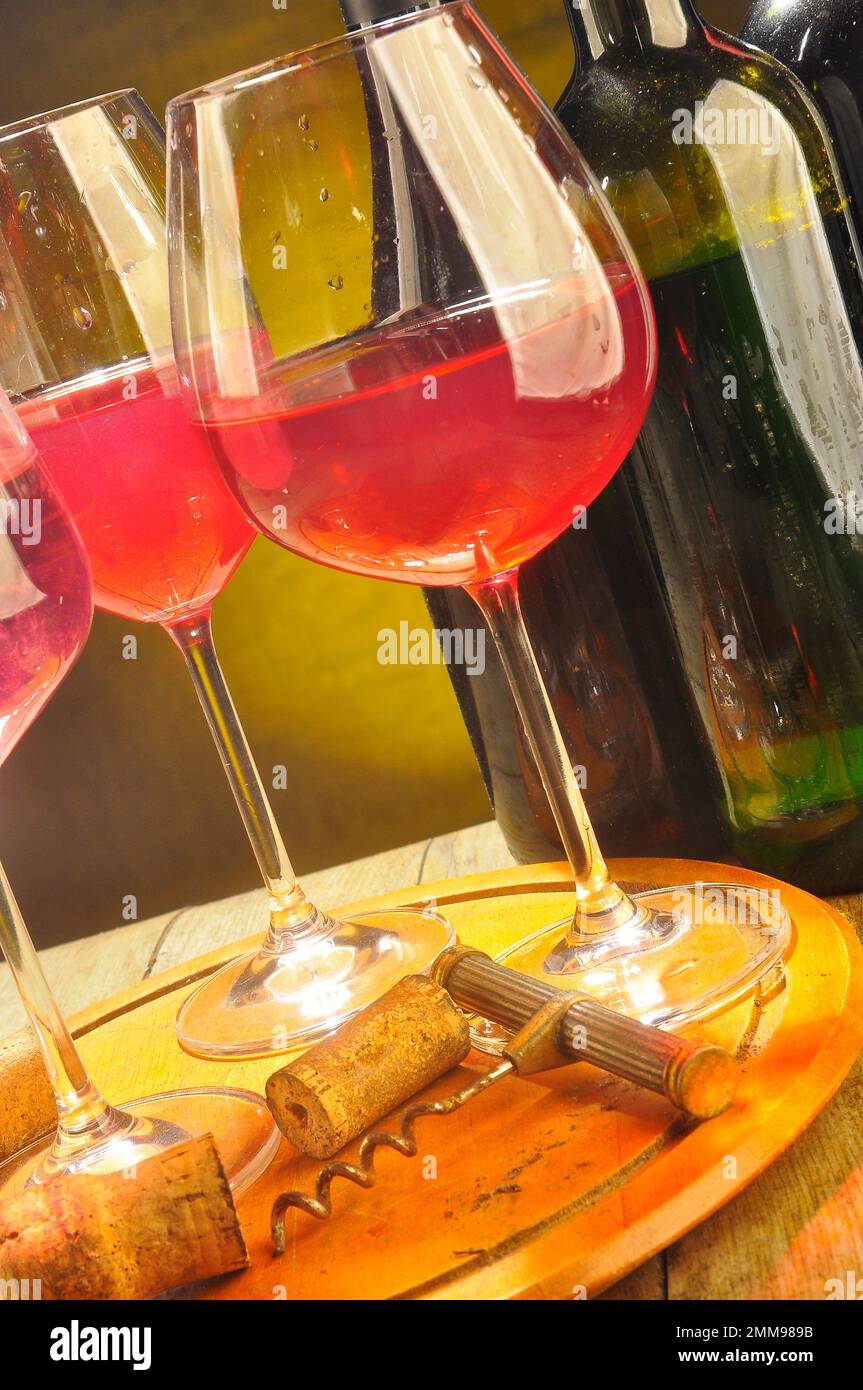 Glass and bottle of wine on studio shot Stock Photo - Alamy